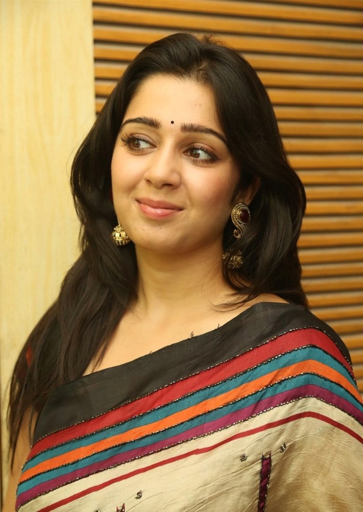Charmi Kaur Latest Cute Smile With Hot Glamour PhotoShoot Images In ...