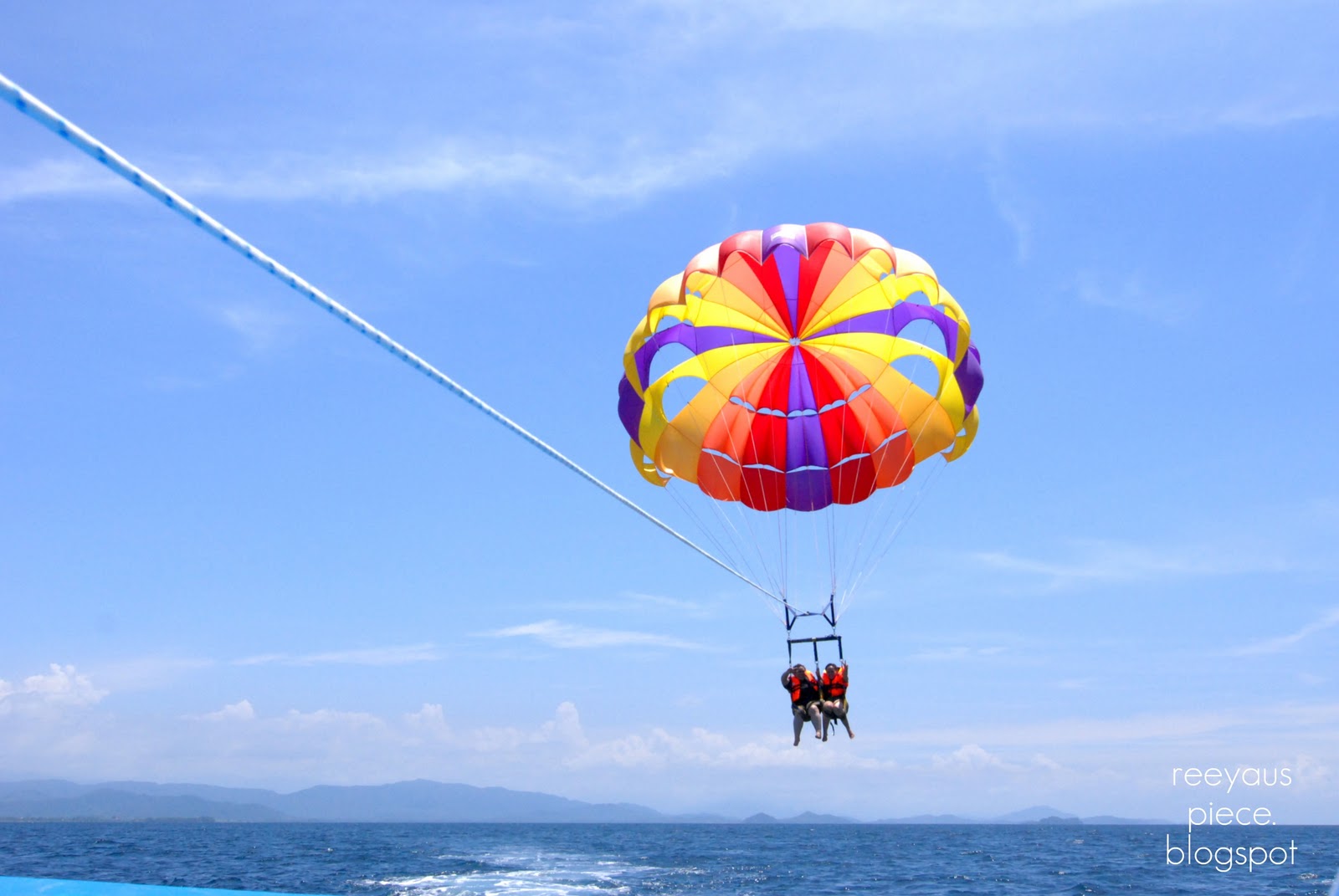Gladly Wandering: Manukan Island : Parasailing