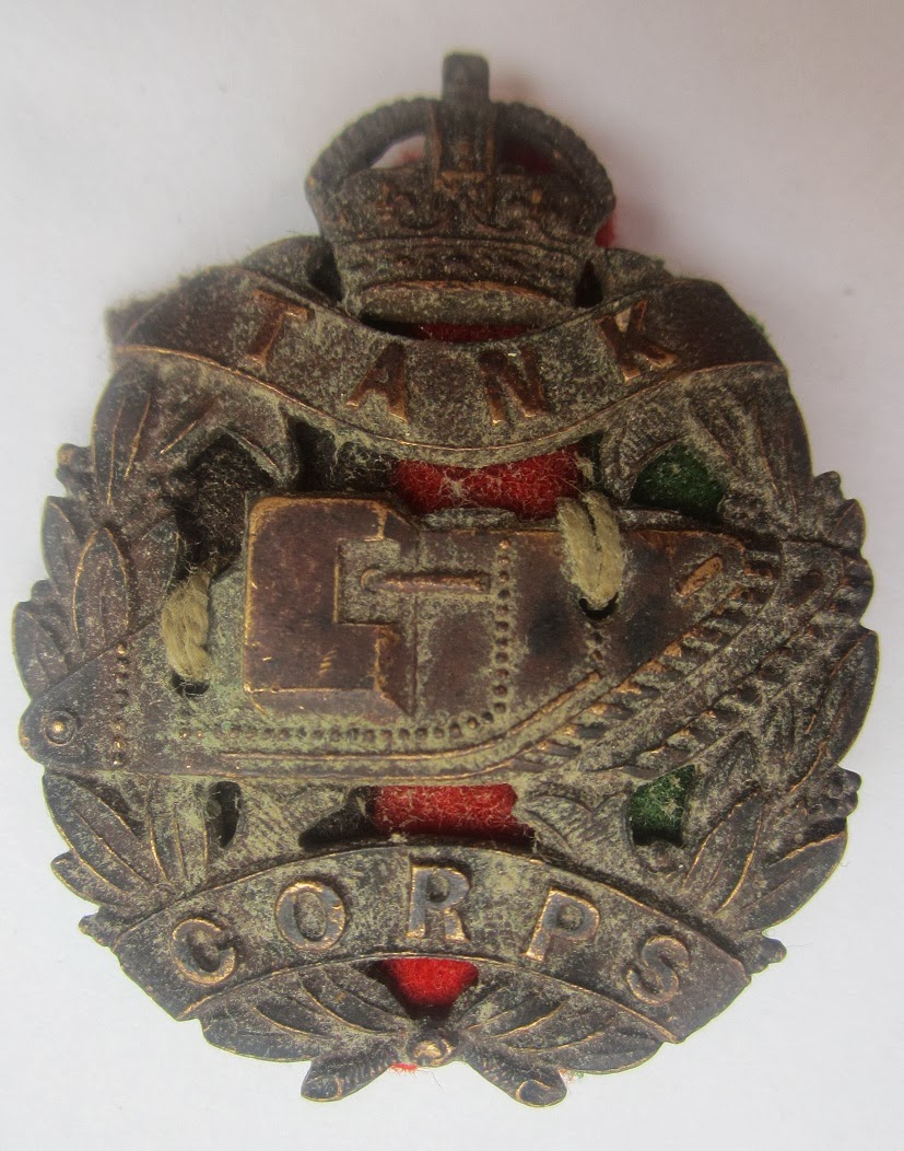Hearts and Daggers: Tank Corps Cap Badge with Colours of Corps