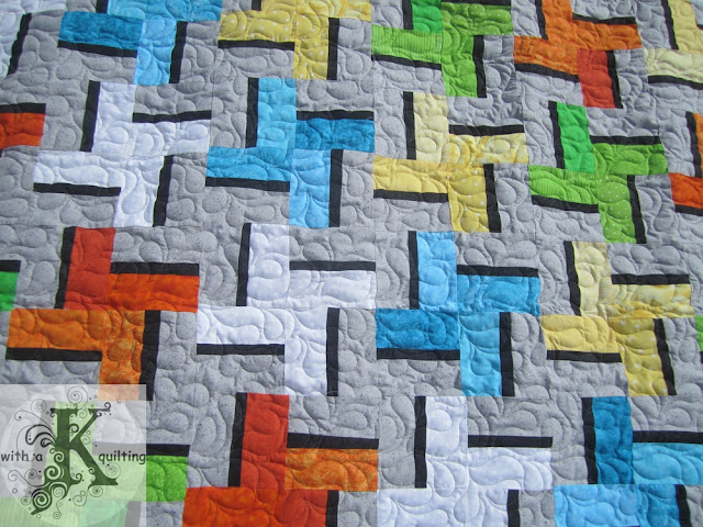 with a K quilting: Timothy School - Autism Awareness