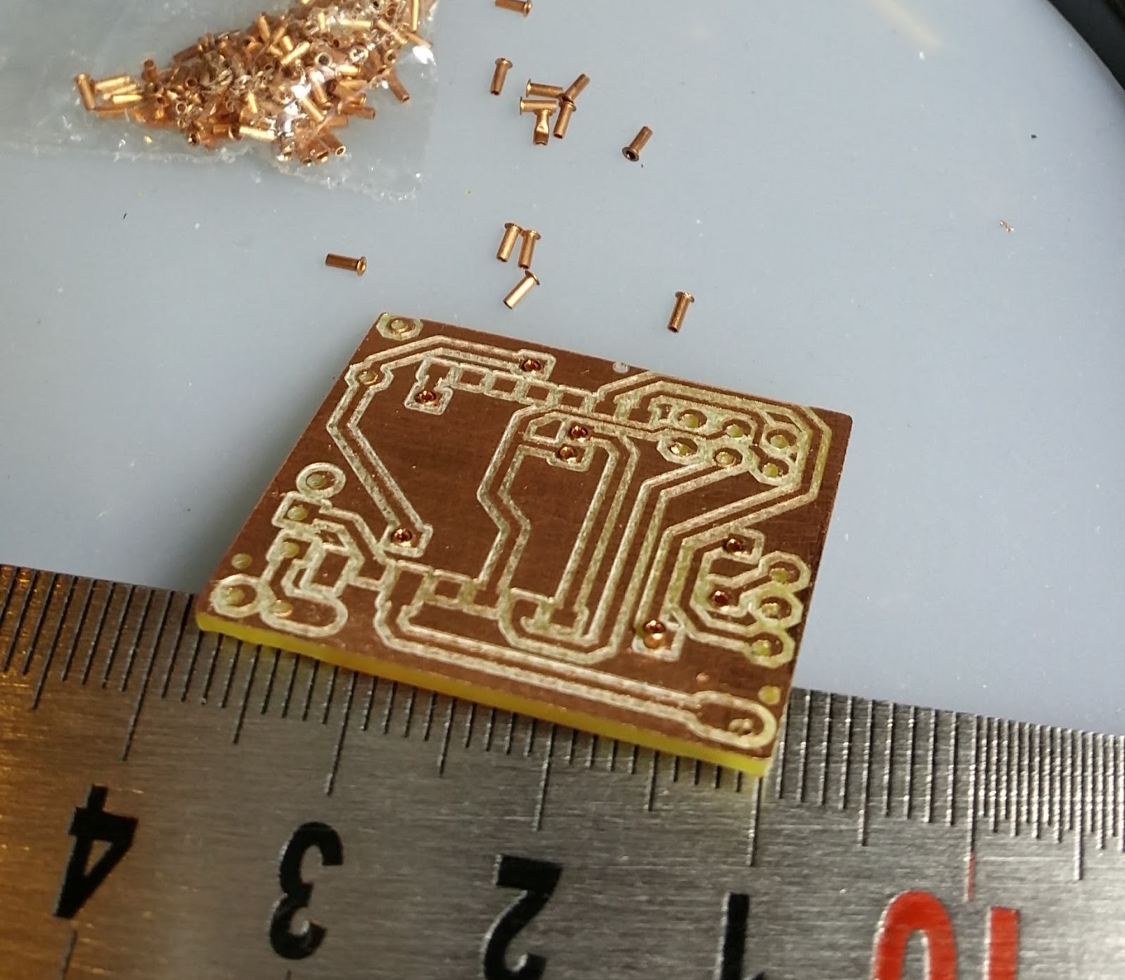 Oz for us: Using PCB rivets vias for homemade double sided PCB