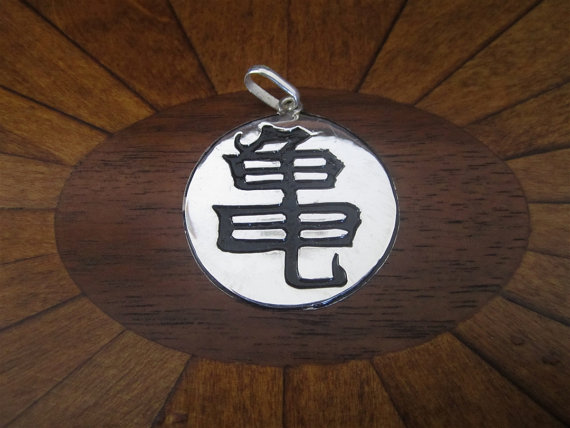 Dije del símbolo del Maestro Roshi | La Guarida Geek