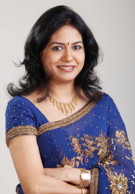 Singer Sunitha In Red Saree