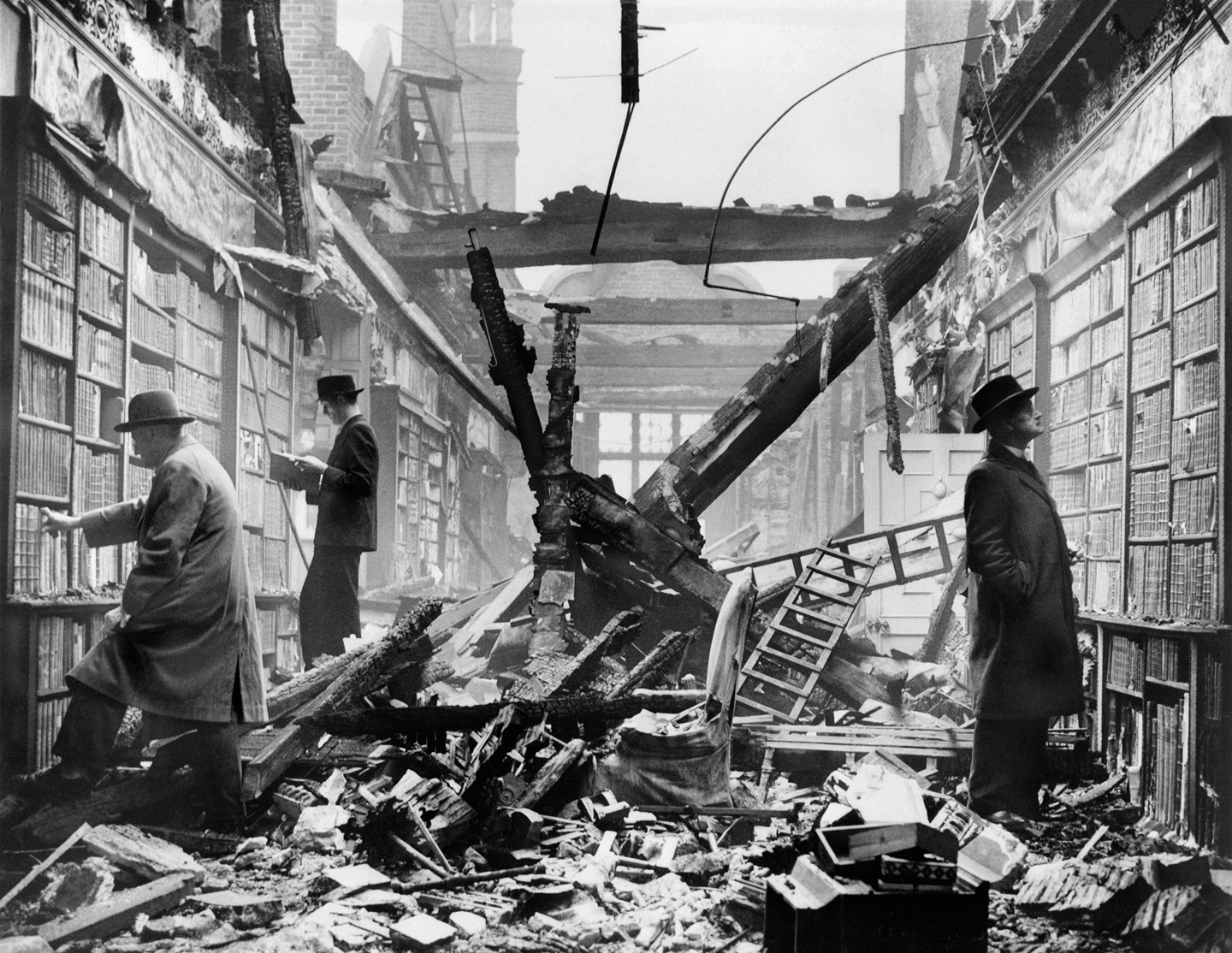An Iconic Photograph of Men Reading Books in the Largely Undamaged ...