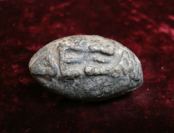 TYWKIWDBI ("Tai-Wiki-Widbee"): Sling bullet from the 4th century BC