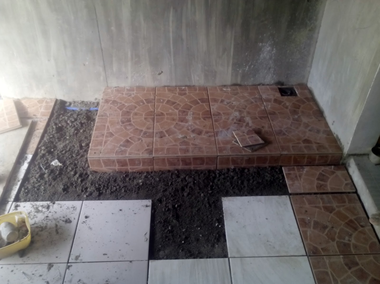 BUILDER'S JOURNAL: TILE INSTALLATION: CONCRETE DRY PACK METHOD