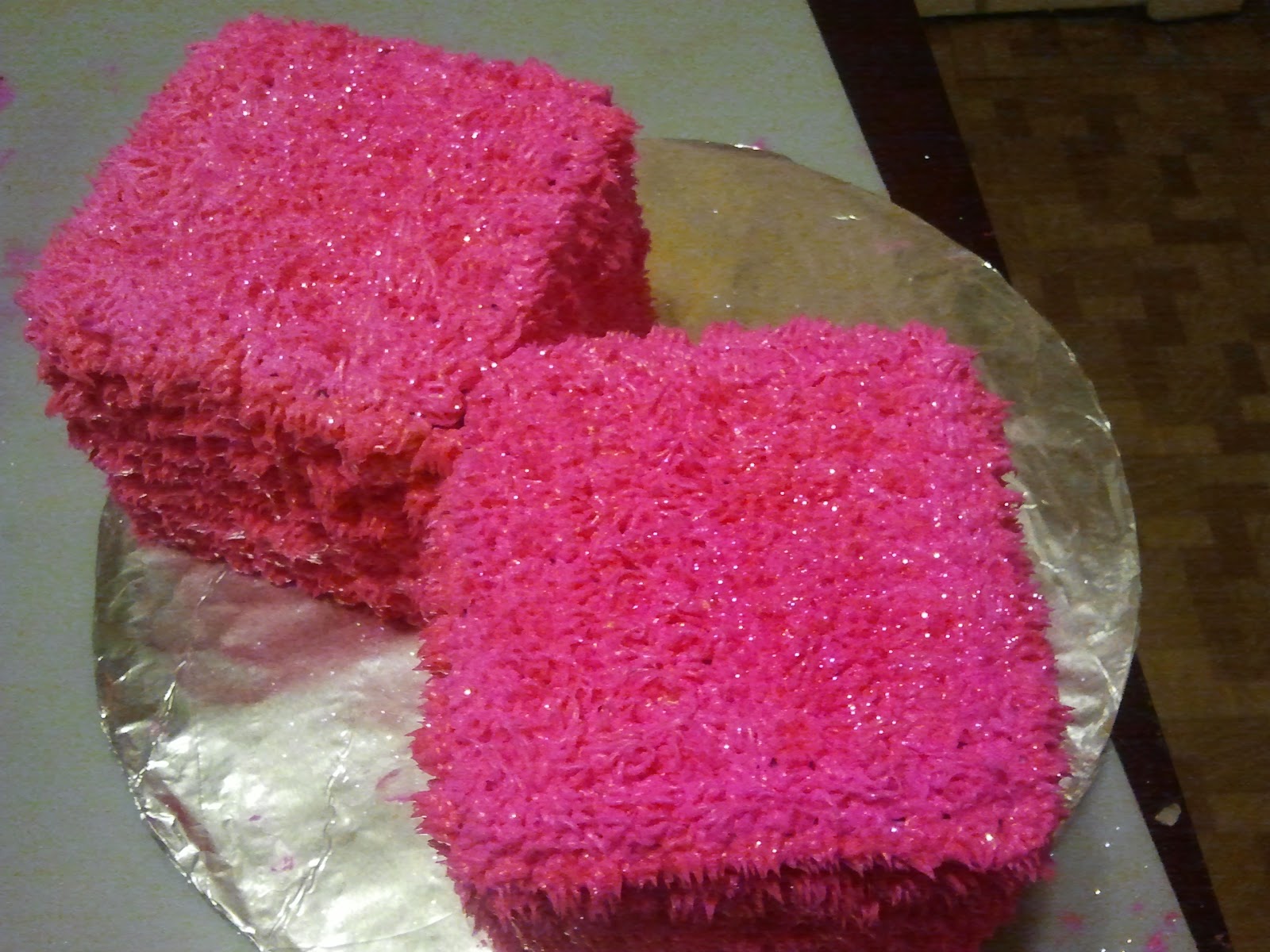 The Cake Villain: Sparkly pink fuzzy dice cake