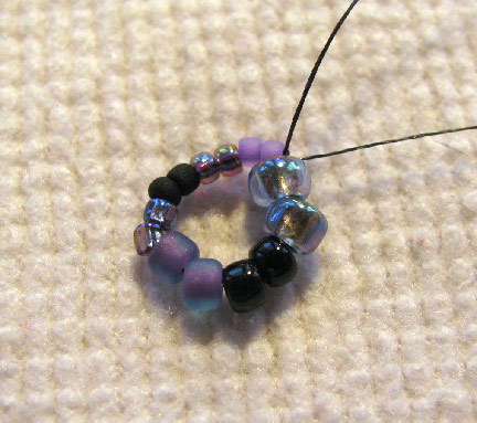 Cellini spiral beaded beads