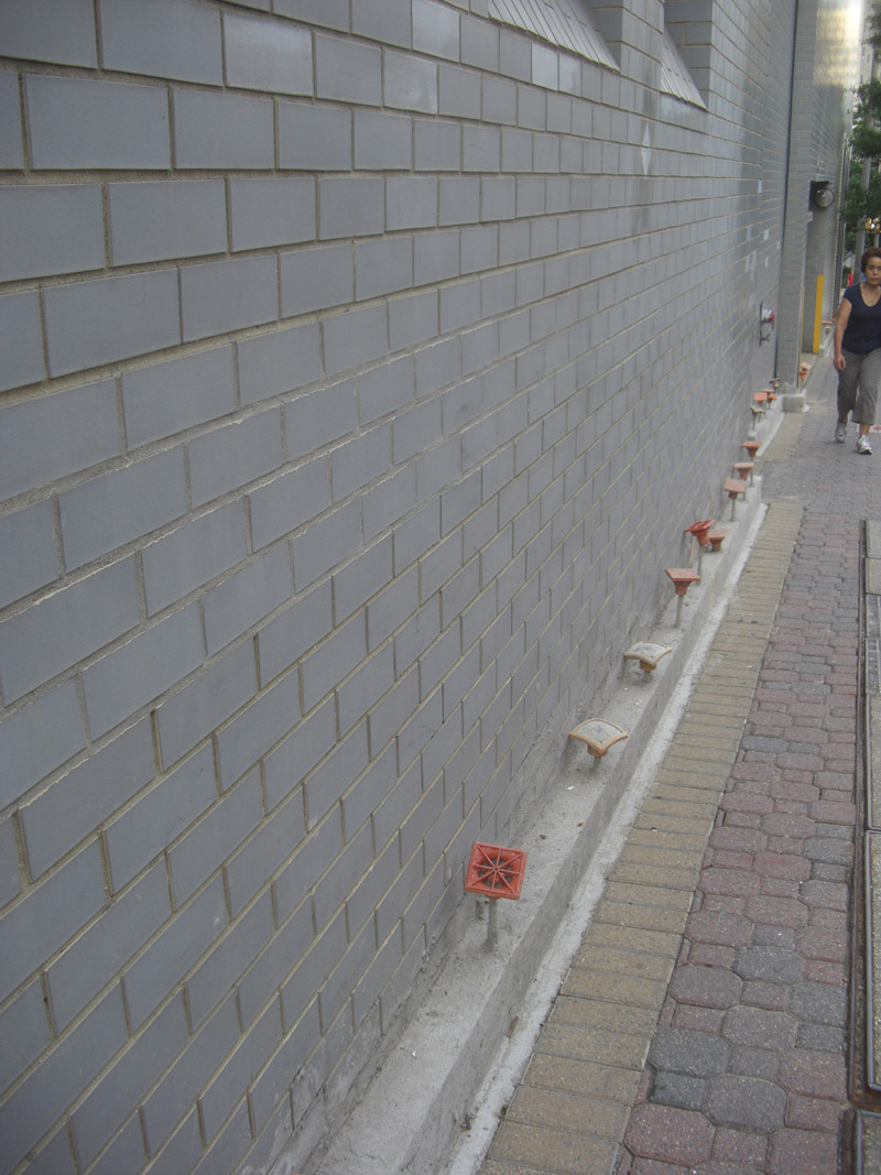 Ode Street Tribune: from dull grey brick to glistening granite