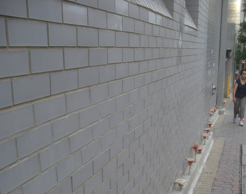 Ode Street Tribune: from dull grey brick to glistening granite