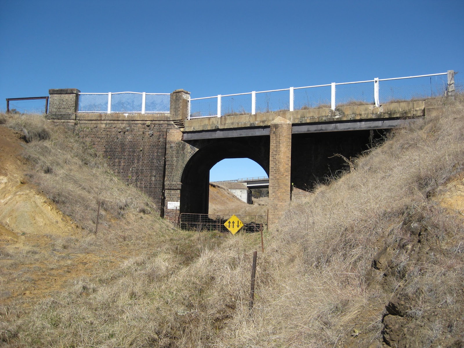 BOLIVIA: WINTERS ROAD OVER BRIDGE