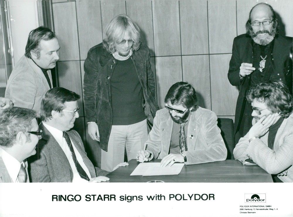 Meet the Beatles for Real: Sign on the dotted line