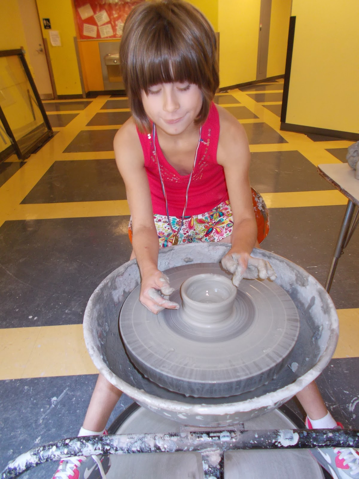 Clay and Mosaic Extravaganza: Students work with clay to make artwork ...