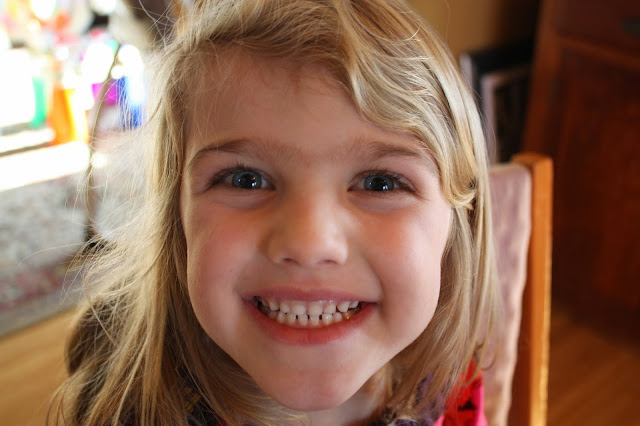 Little For A Little While: HOW MY BABY GIRL LOST HER FIRST TOOTH.
