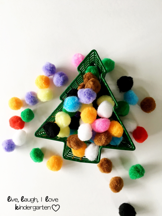 Then, we used pom poms to cover each number after we rolled our dice.