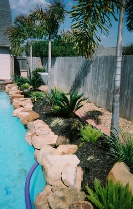 Home And Garden : Artificial Rocks around swimming pool