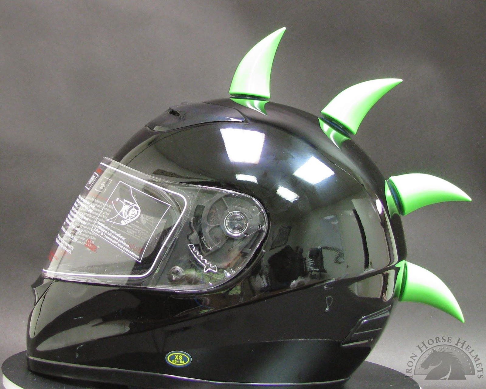 Motorcycle Helmets: Green motorcycle helmet horns