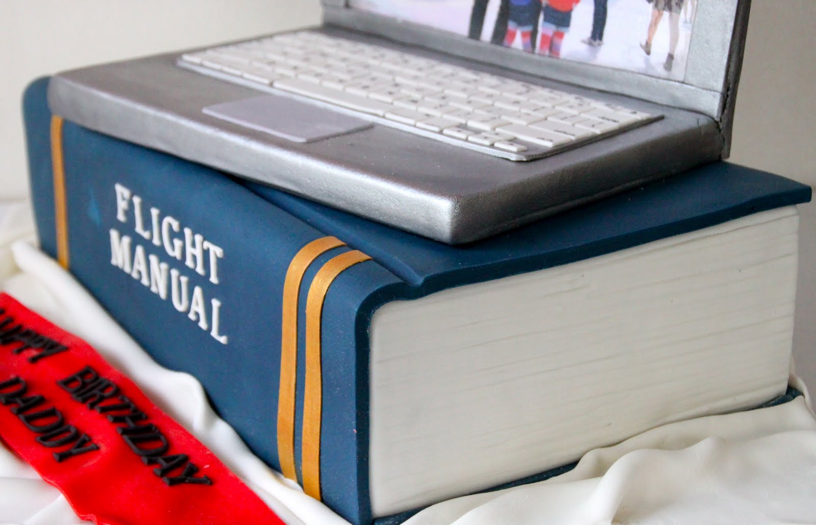Celebrate with Cake!: MacBook Flight Manual Cake