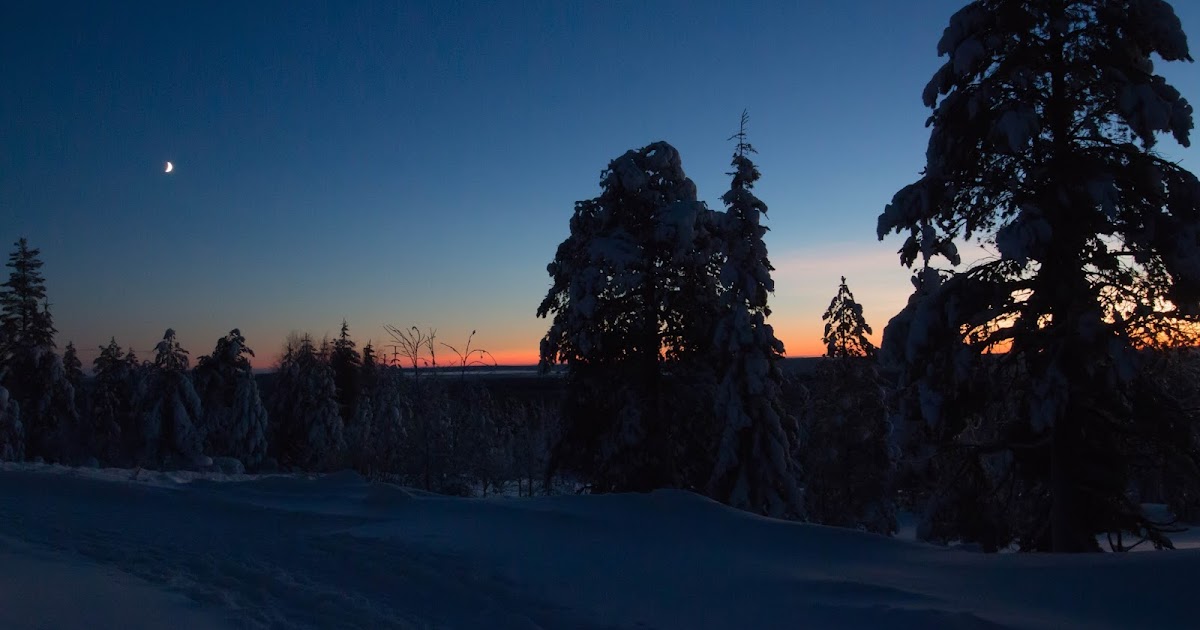 Auringonlasku Ainiovaaran huipulla