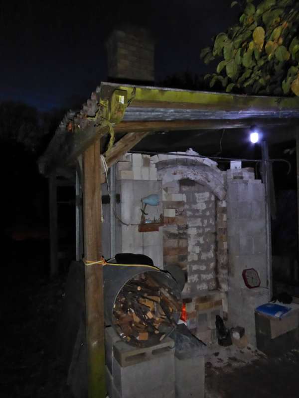 Firing a reconstructed wood fired kiln.