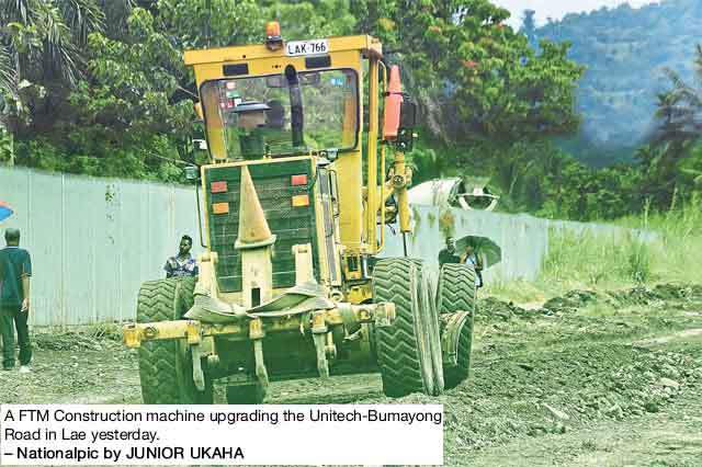 K4 million Cheque for upgrading of Bulolo Township Road - One Papua New ...