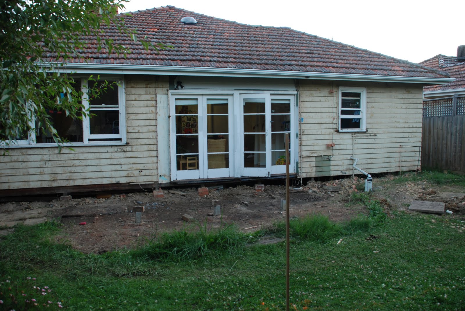 GeorgyG Design: Before and after - brick to weatherboard