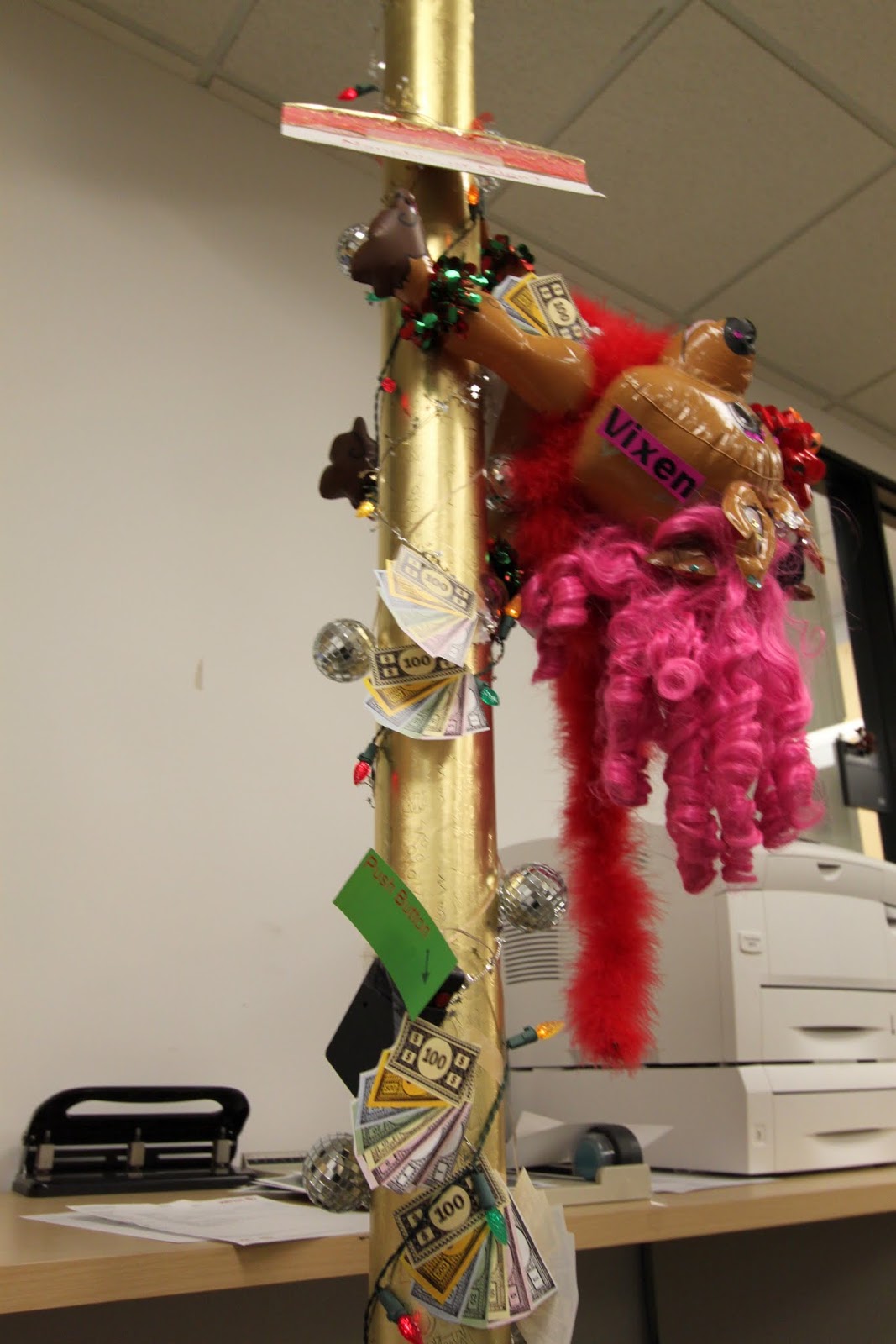 the office holiday pole decorating contest | mid-century modern remodel