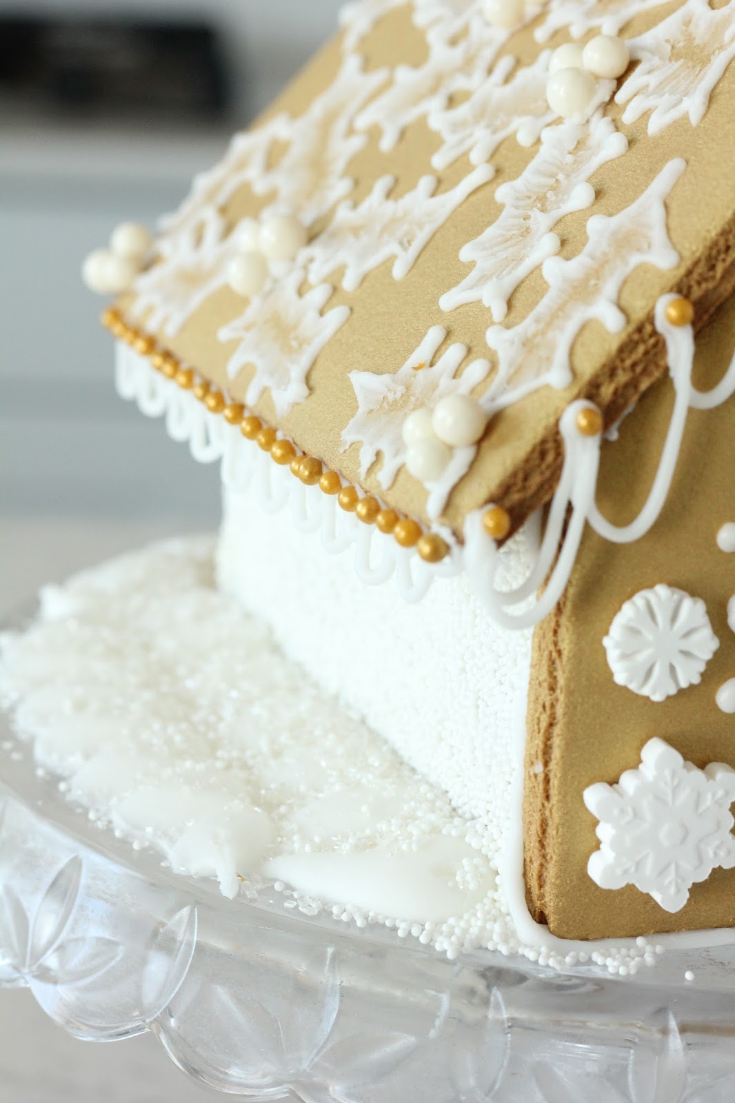 White and Gold Gingerbread House