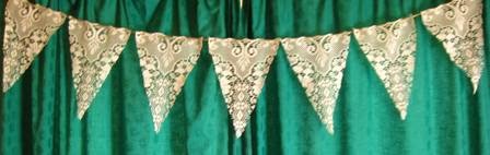 Going Grey and Slightly Green: Vintage bunting from old lace curtain.