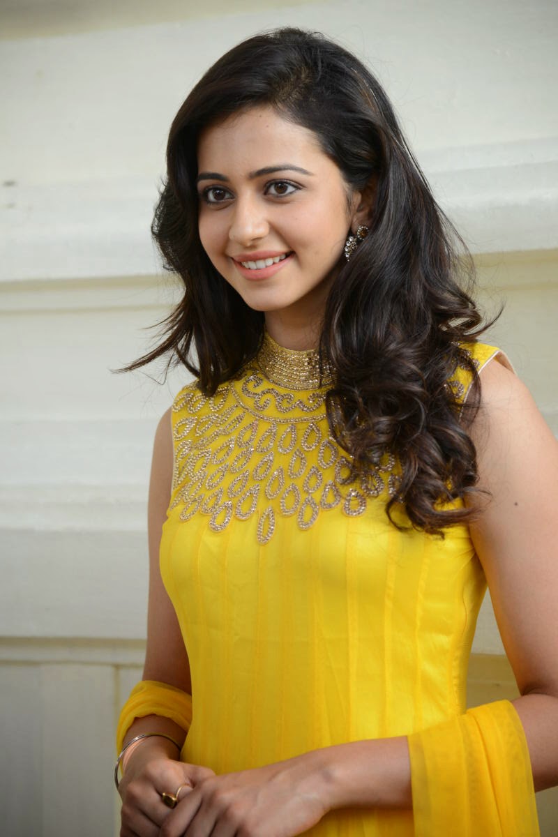 Actress Rakul Preet Singh Stills In Yellow Dress - Rakul Preet Singh