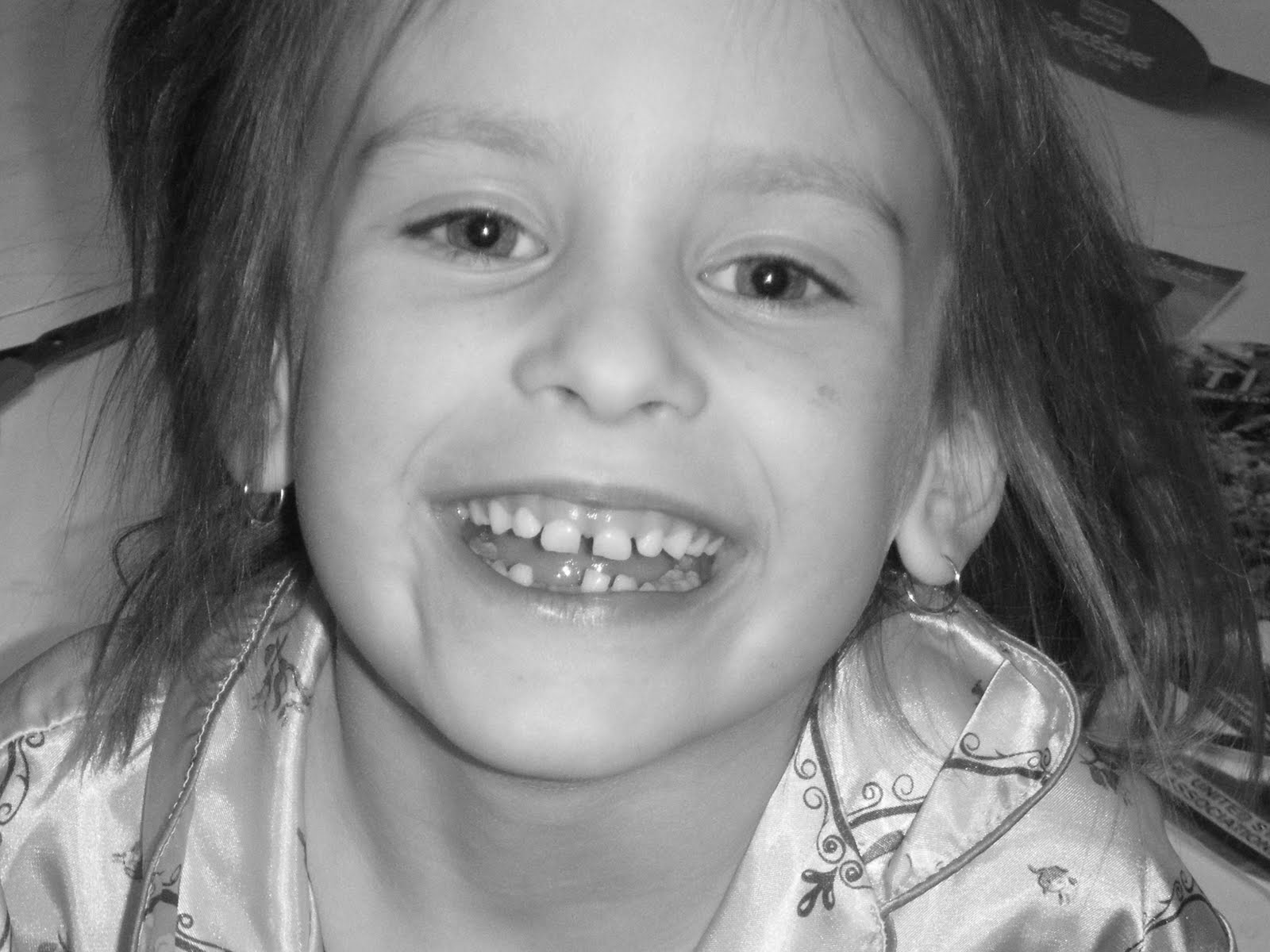 Living every moment...: Look who lost her first tooth!!