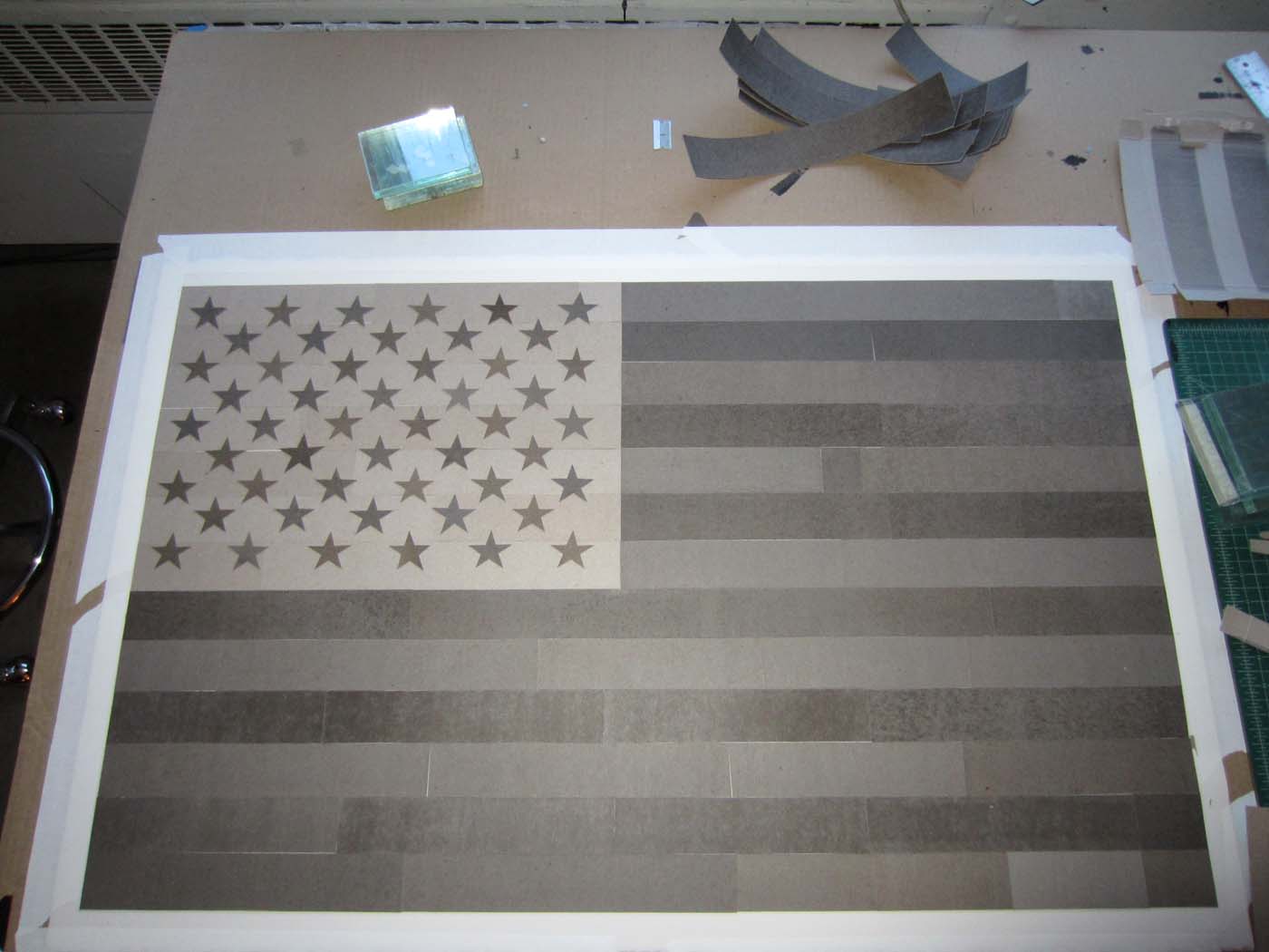 Michael McGuire: More Recycled Cardboard Flag Collages