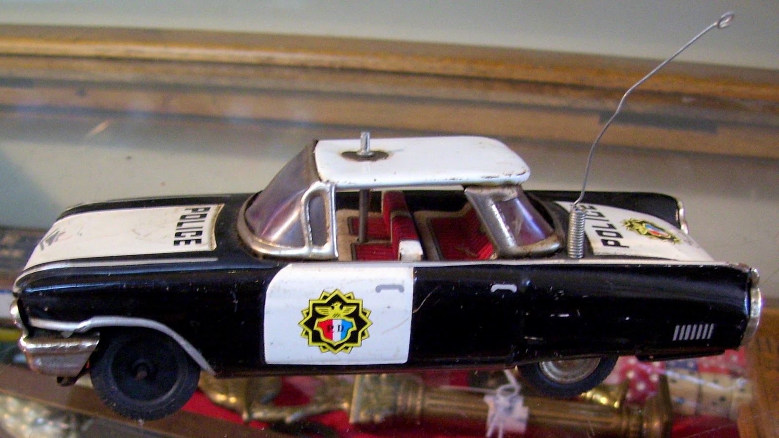 Estate Shop: Vintage Toy Badges and 1950's Cadillac Tin Toy Police Car