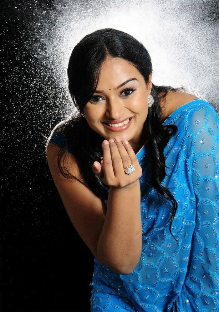 Actress Singer Anupama Romantic Blue Saree Stills