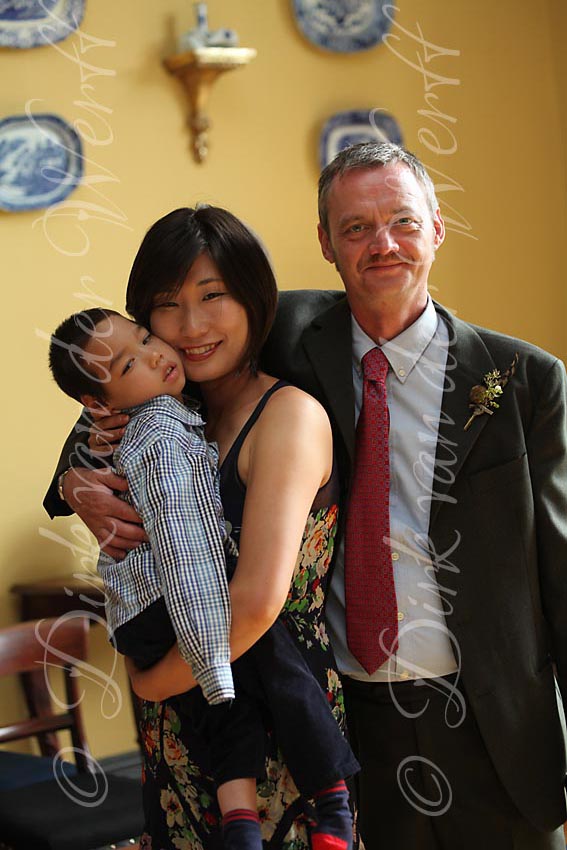 ONE OF JONATHAN'S SIX BROTHERS WITH HIS JAPANESE WIFE AND SON