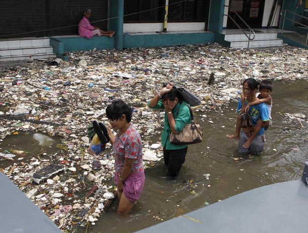 Storm surge leads to floods. (Typhoon GENER ~ International name ...