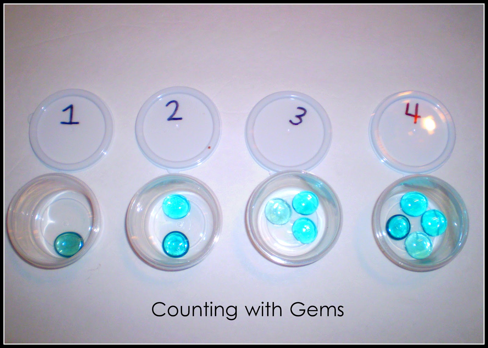 Toddler Activities Using Containers - The Activity Mom