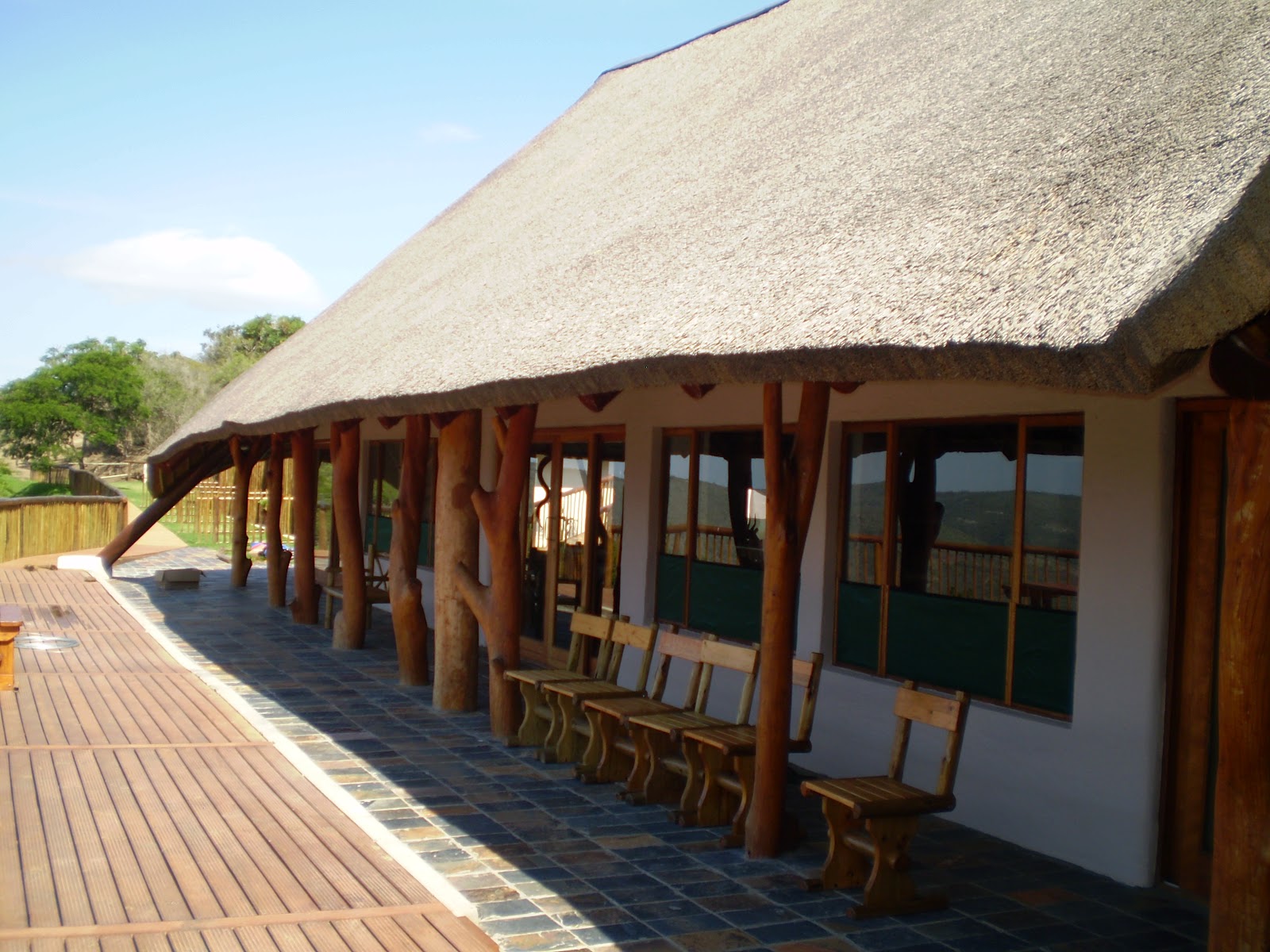 The Natural Look - A Guide to Incorporating Tree Trunks into Thatch ...