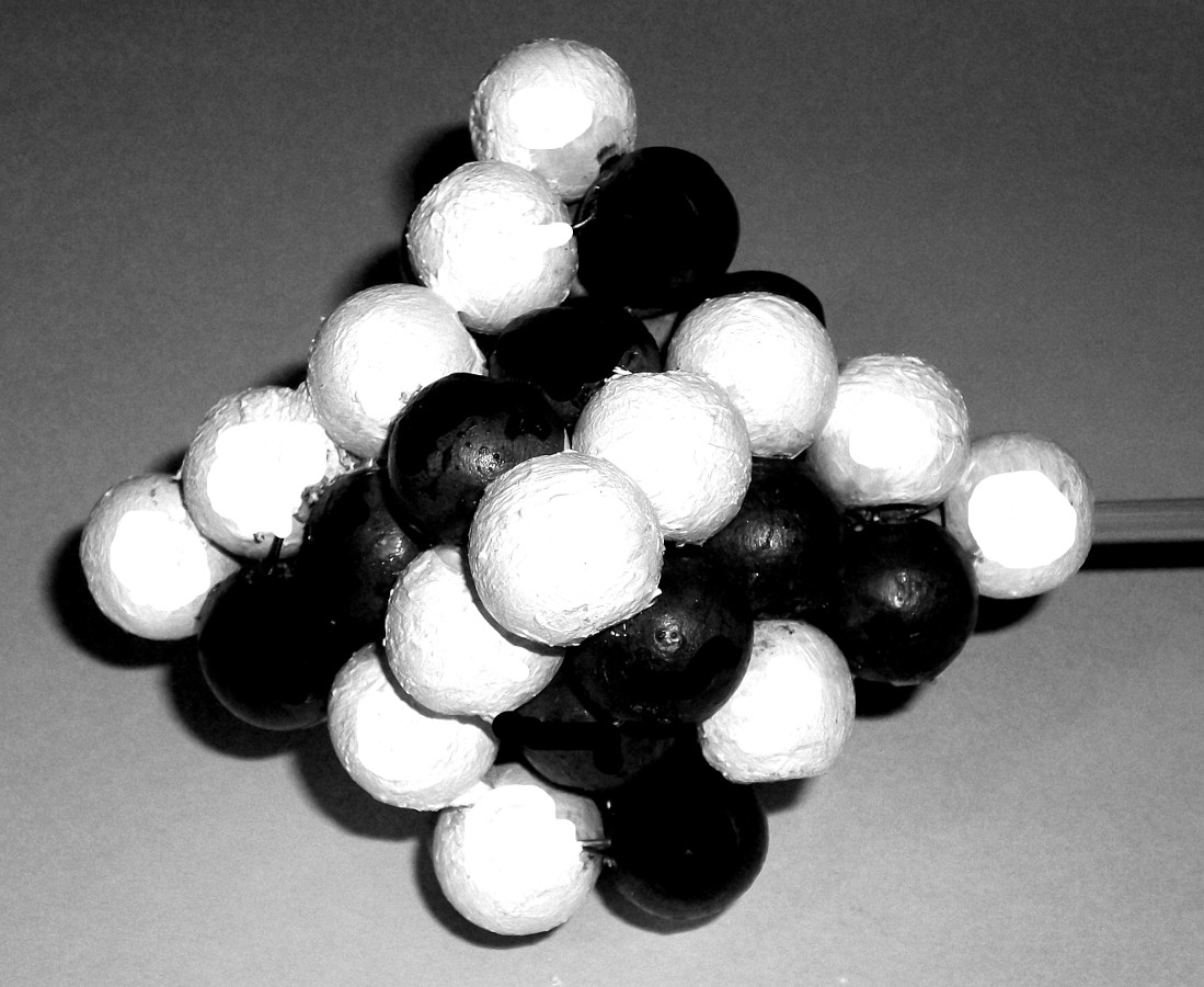 A Traction from Gravity to EM: Iron 56