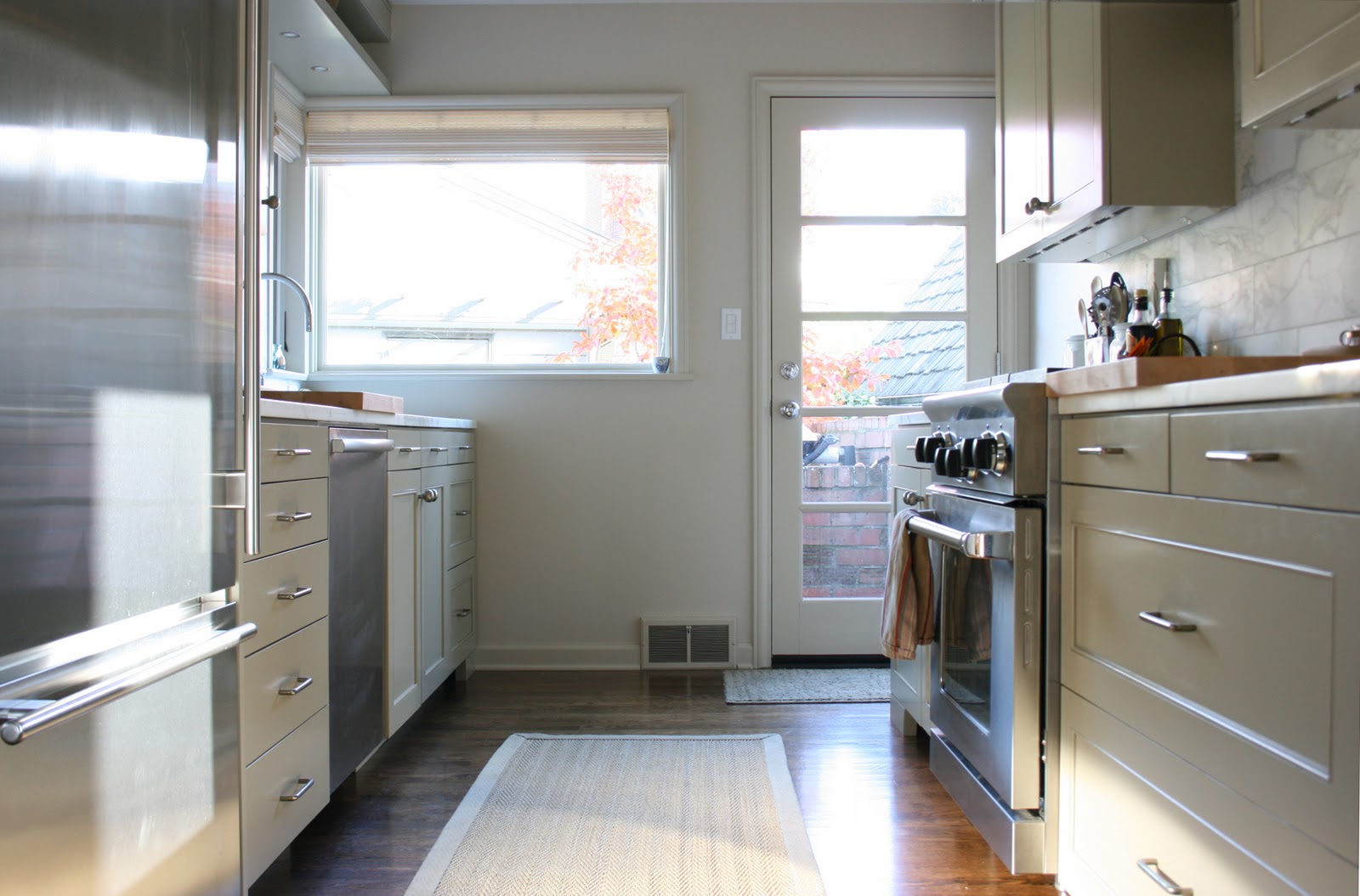Lots of windows and light make this galley-style kitchen very bright ...
