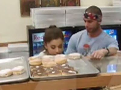 Doughnut shop owner wants to press charges against Ariana Grande
