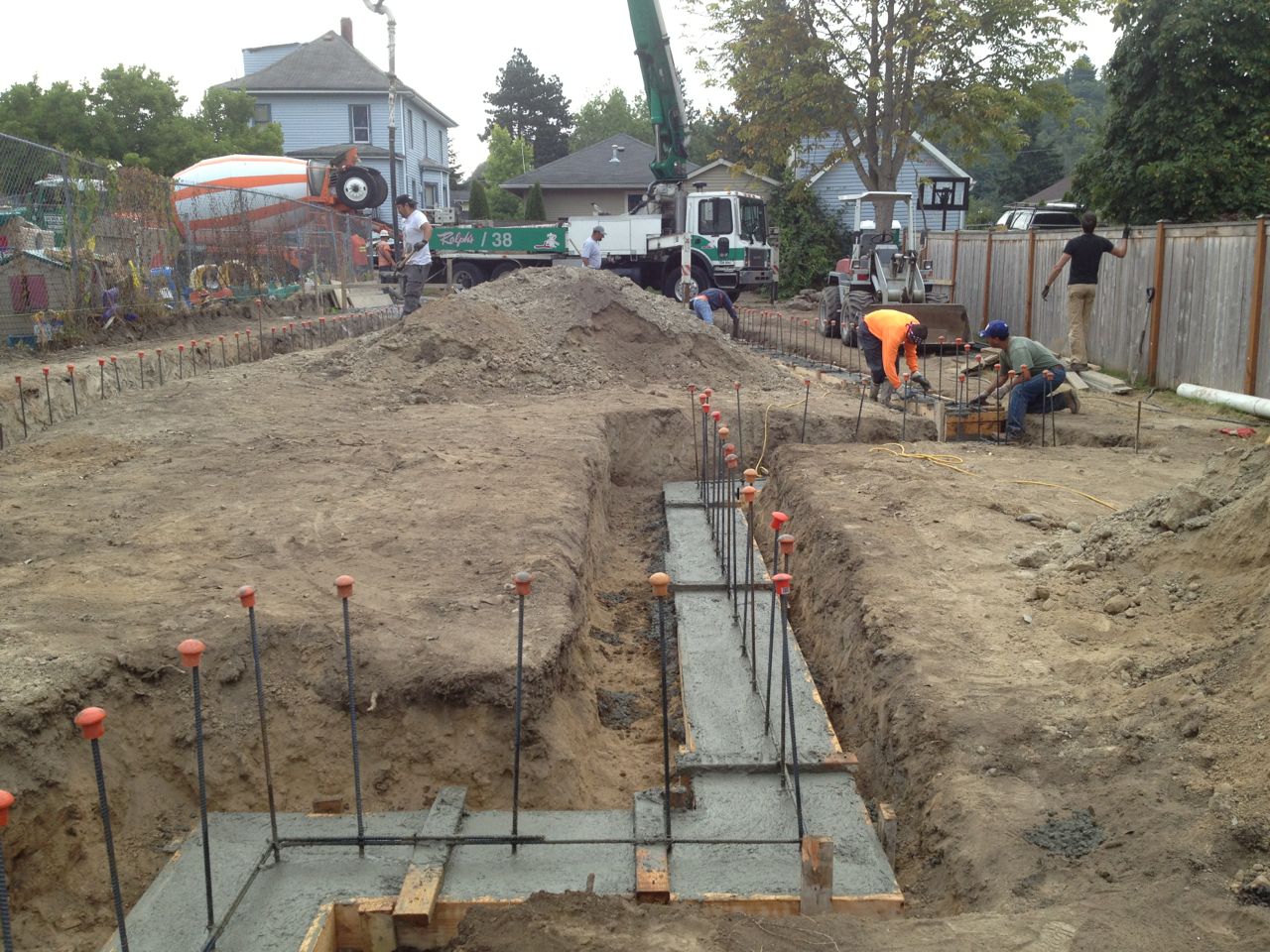 details of home: staking, tree removal, excavation & footings