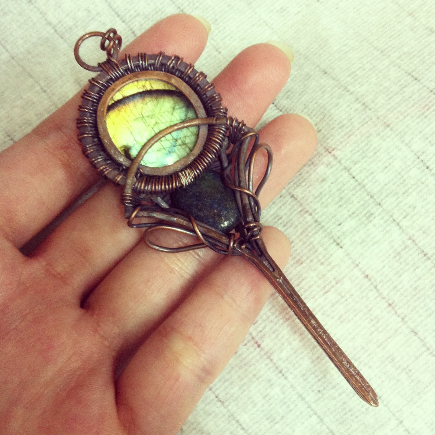 Handmade wire wrapped, filigree, fantasy and steampunk jewelry.