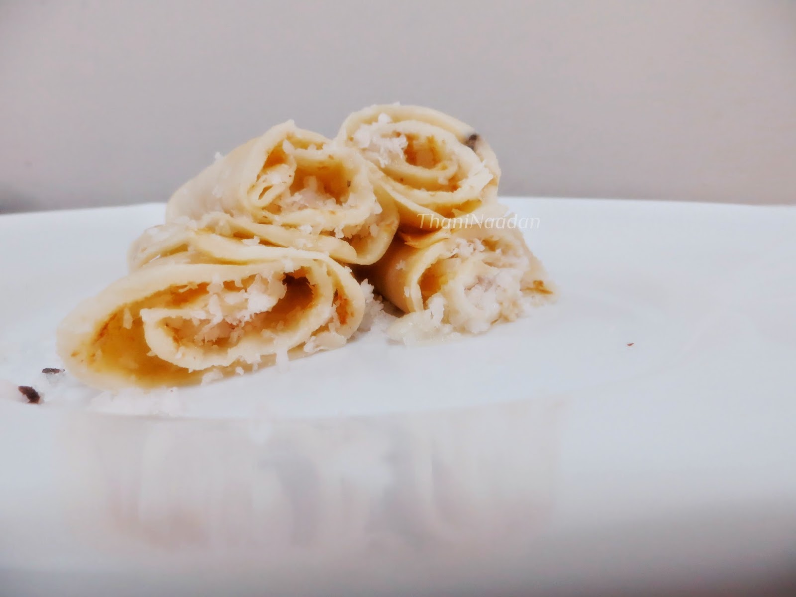 Mutta Kuzhalappam /Coconut Pancake Rolls ~ Thani Naadan