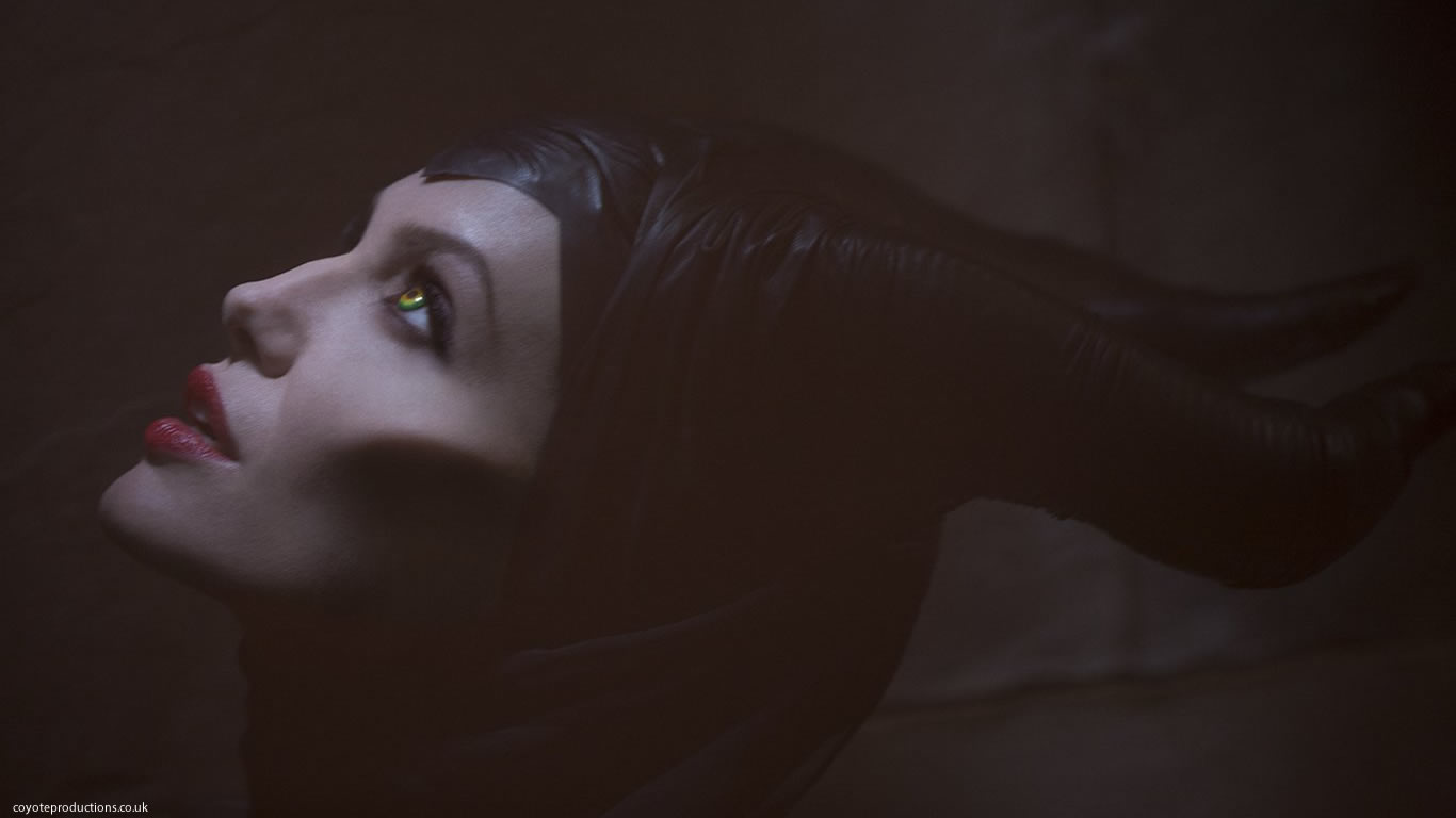 under the small umbrella: Maleficent gets some wallpaper