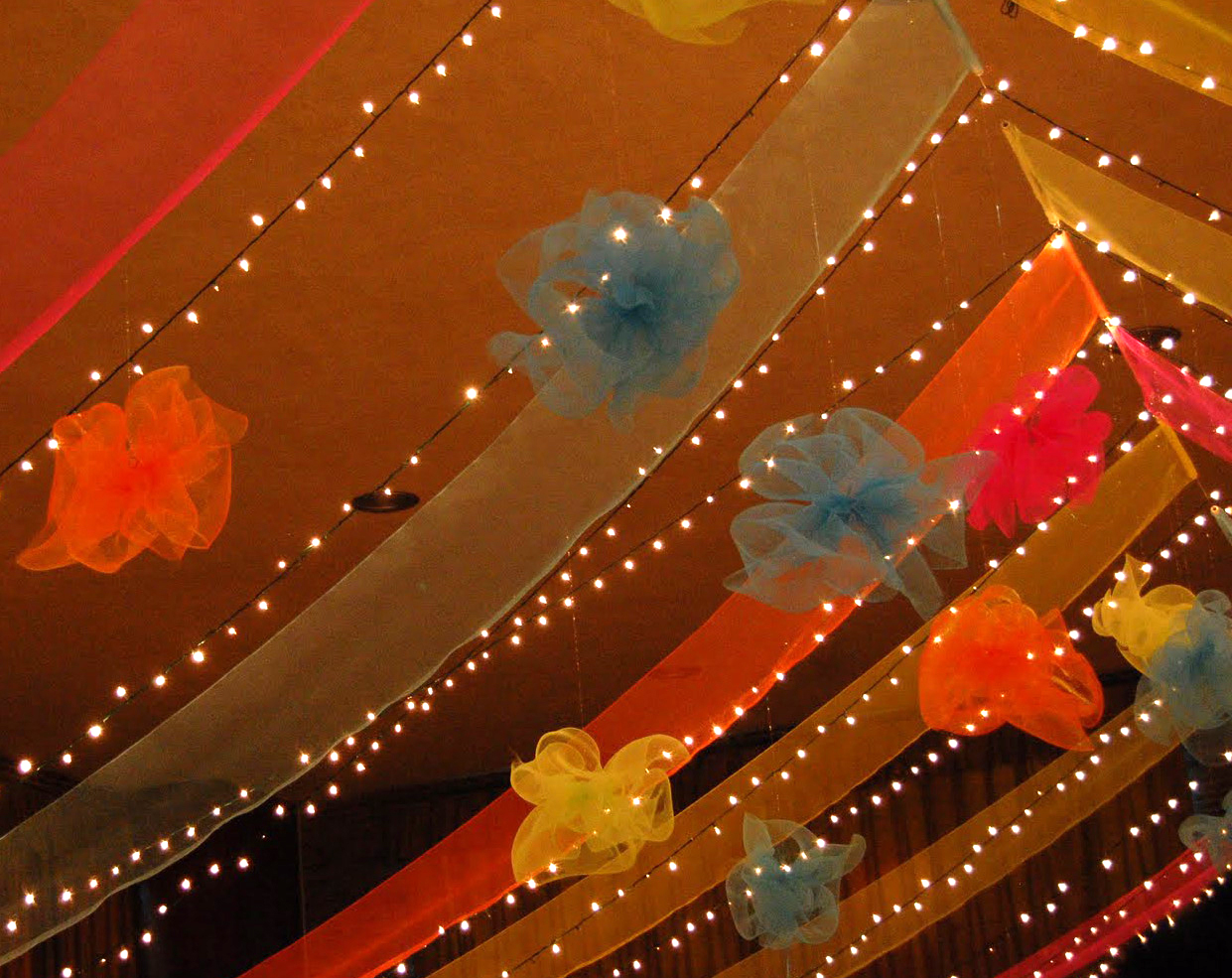 Party Ideas by Mardi Gras Outlet: Draped Deco Poly Mesh Ceiling Tutorial