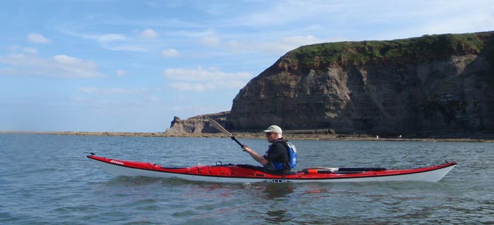 Dunsley in Staithes: Sea kayaks and surf at Staithes