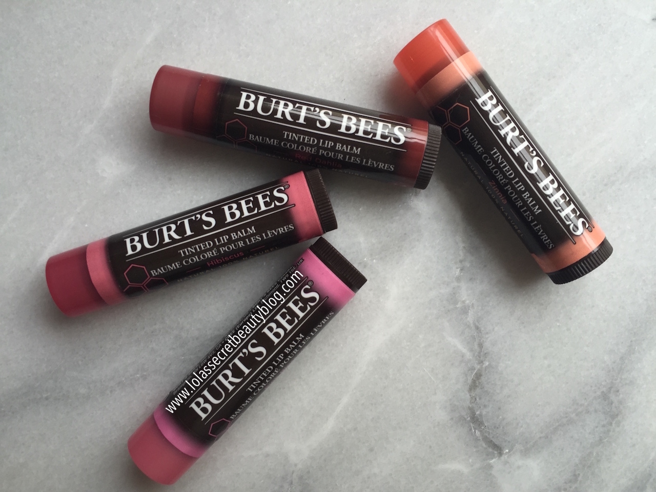 Lolas Secret Beauty Blog Burts Bees Tinted Lip Balm In Pink Blossom Hibiscus Red Dahlia And