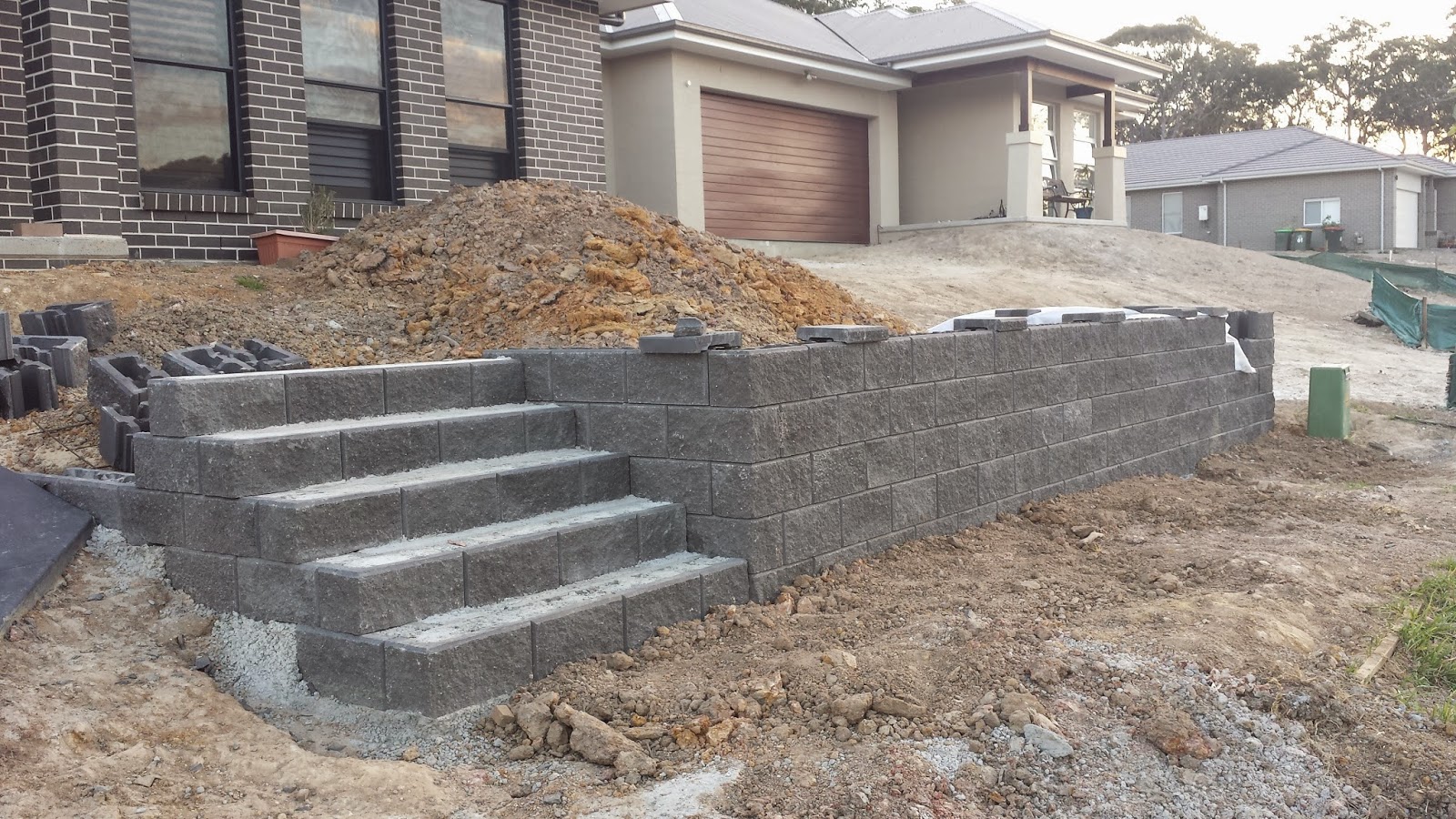 Santorini Bonnells Bay: Retaining walls awaiting core and backfill