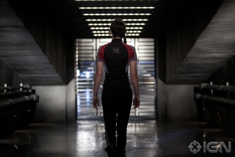 Welcome to District 12: New Hunger Games Still! Katniss in her training ...